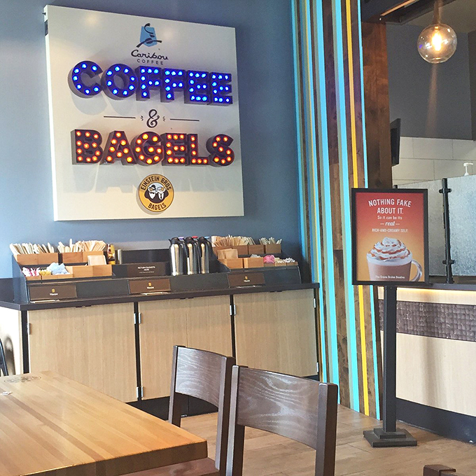 Step into a world where coffee and bagels reign supreme. This neon-lit sanctuary is where dough dreams come true.