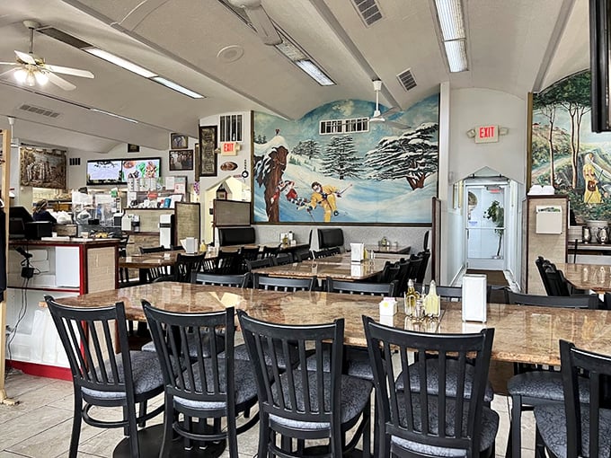 Step inside and feast your eyes on the unexpected winter wonderland mural. Who knew Lebanese cuisine paired so well with alpine scenery? It's like "Cool Runnings" meets "Mama Mia!"