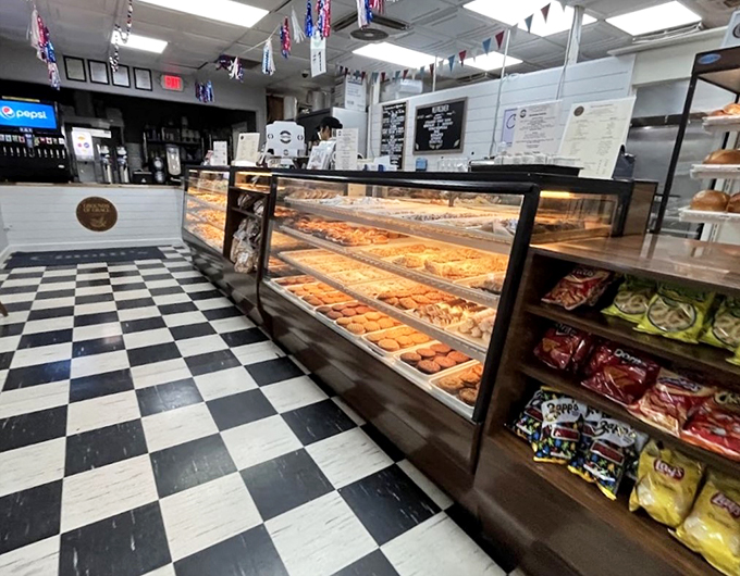 Step into a world where calories don't count. This retro-chic interior, with its checkered floor and glass cases, is a time machine to simpler, sweeter times.