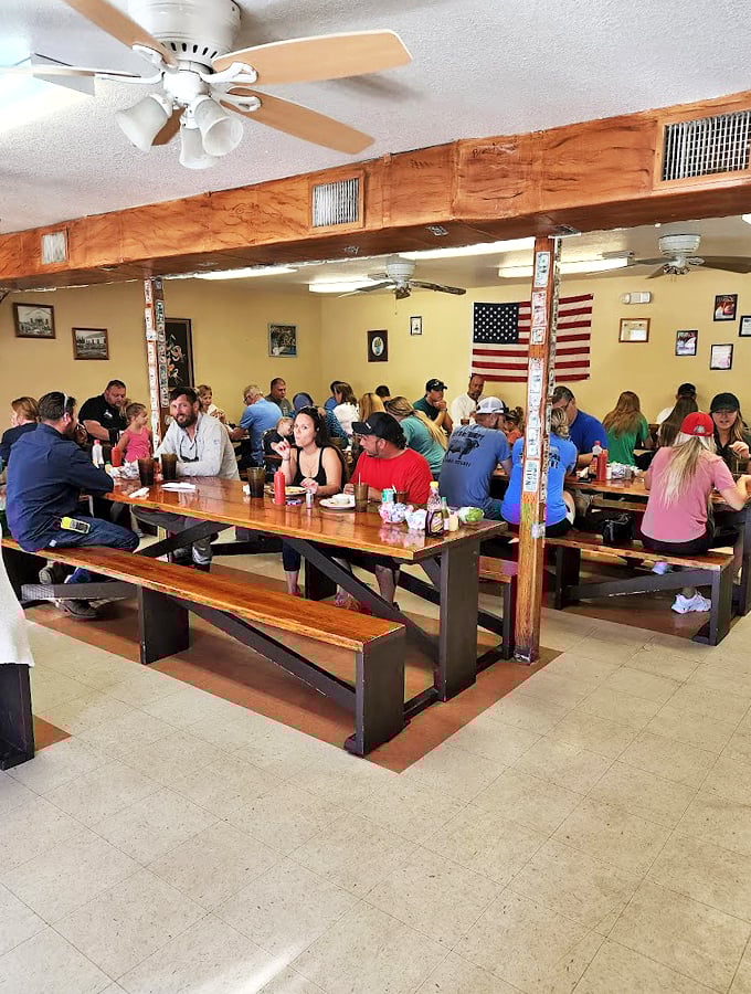 Forget fancy tablecloths - here, American flags and picnic-style seating create an atmosphere as warm and inviting as grandma's kitchen.