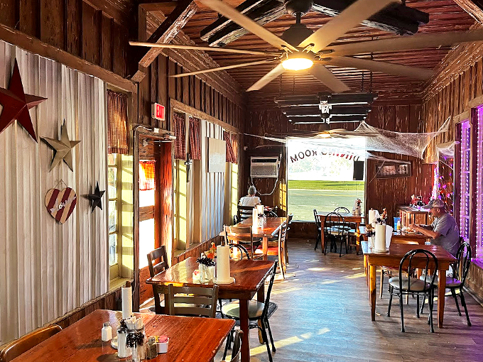 Step into a time machine of taste! This rustic dining room whispers tales of comfort food that'll have you saying, "Mama, I'm home!"