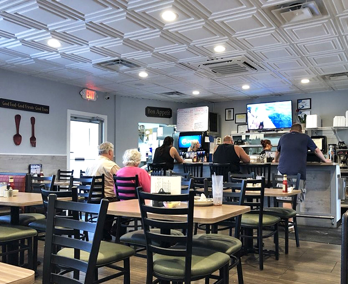 Clean lines, warm lighting, and cozy seating create the perfect backdrop for Monroe's favorite gathering spot. Home is where the hash browns are.