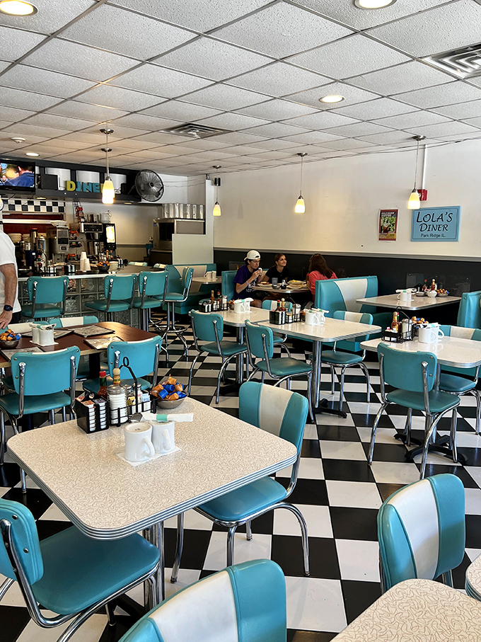 Step into a '50s time warp! Lola's interior is where "Happy Days" meets happy bellies, complete with chrome, checkered floors, and comfort food galore.
