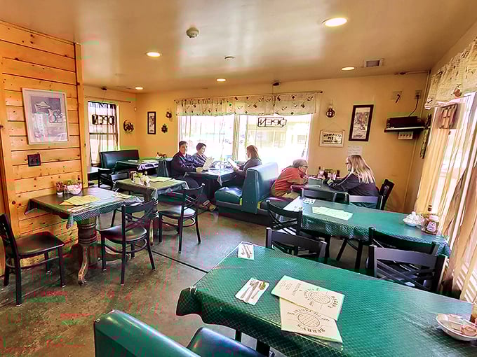 Step into a time machine disguised as a diner. With its cozy booths and checkered tablecloths, Berry's interior is where nostalgia meets comfort. Photo credit: Johnathan Covey II