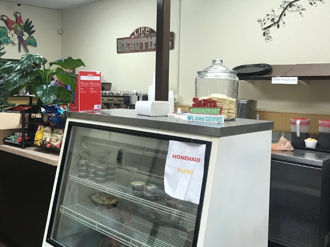 Step into a world where tropical vibes meet comfort food heaven. This interior could make even a cactus feel at home! Photo credit: Leon Dorado