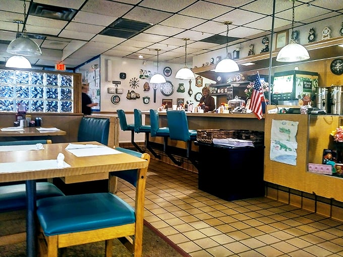 Step into a time capsule of comfort! This diner's walls are a gallery of ticking treasures, each clock telling a story of countless shared meals. Photo credit: Cristina Tringali