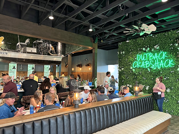 Step inside and feel the buzz! This isn't just a restaurant; it's a lively gathering spot where seafood dreams come true and friendships are forged over perfectly cracked crab. Photo credit: Donny Lamey