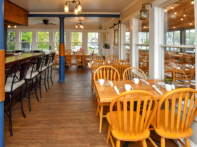 Step into a Norman Rockwell painting with a dash of maritime flair. The warm wood tones and large windows create an atmosphere as comforting as a bowl of chowder on a foggy day.