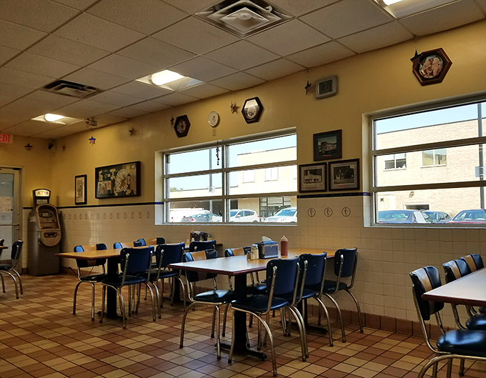Retro chic meets comfort food haven. This dining room's got more character than a Wes Anderson film set, with a dash of Midwest warmth thrown in for good measure.