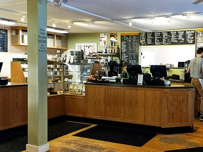 Step into carb heaven! This cozy interior is where pastry dreams come true, and diet resolutions go to die.