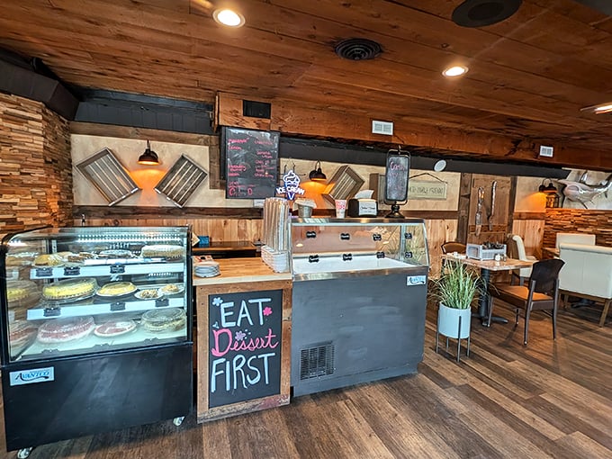 "Eat Dessert First" isn't just a sign here - it's a philosophy. The rustic wood walls and display case of temptations make a compelling argument.