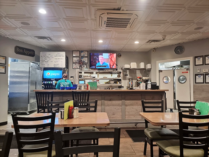 Step into a time capsule of comfort, where the d&eacute;cor whispers "grandma's living room" but the aroma shouts "culinary paradise!" Photo credit: Imran Wajid