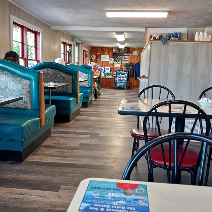 Step into a time capsule of comfort! These turquoise booths have witnessed more happy meals than a McDonald's playground.