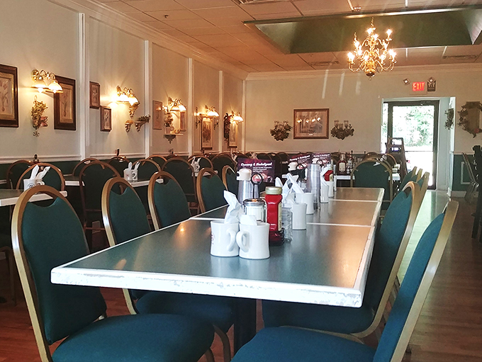 Step into a time capsule of comfort, where the decor whispers "1950s diner" but the aroma screams "breakfast paradise."
