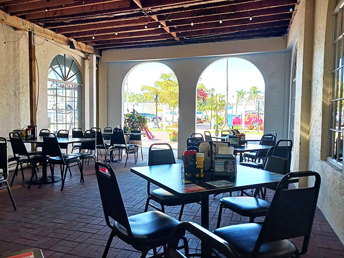 Step into a time machine of taste! This charming dining area feels like your favorite aunt's kitchen, if she were a seafood savant.