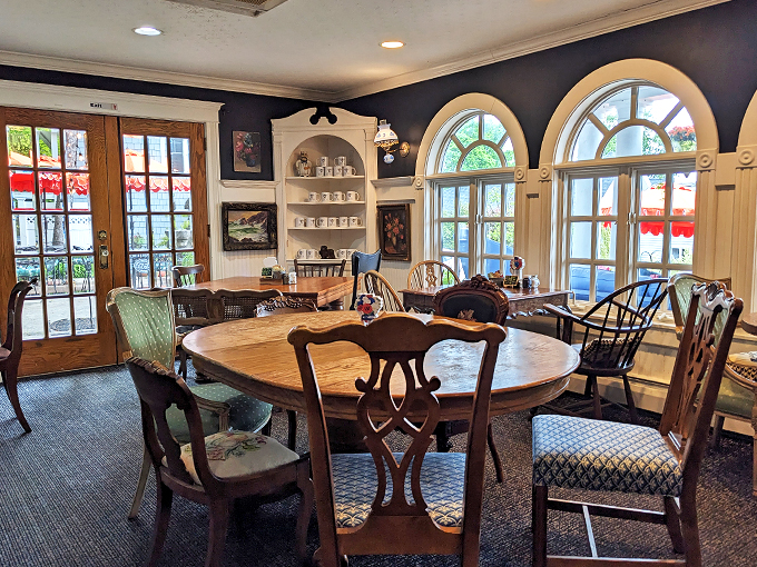 Step inside and feast your eyes on a cozy nook that's part grandma's living room, part culinary wonderland. Eclectic perfection!