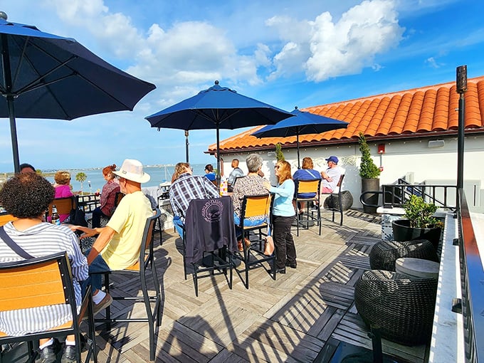 Up on the roof, it's a Florida fiesta! Umbrellas, palm trees, and happy faces &ndash; this is where memories are made and selfies are perfected. Photo credit: Terry Eskew