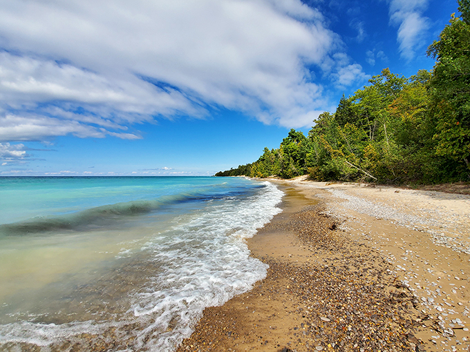 Mother Nature's own infinity pool! The shoreline stretches as far as the eye can see, inviting you to take a stroll into serenity.