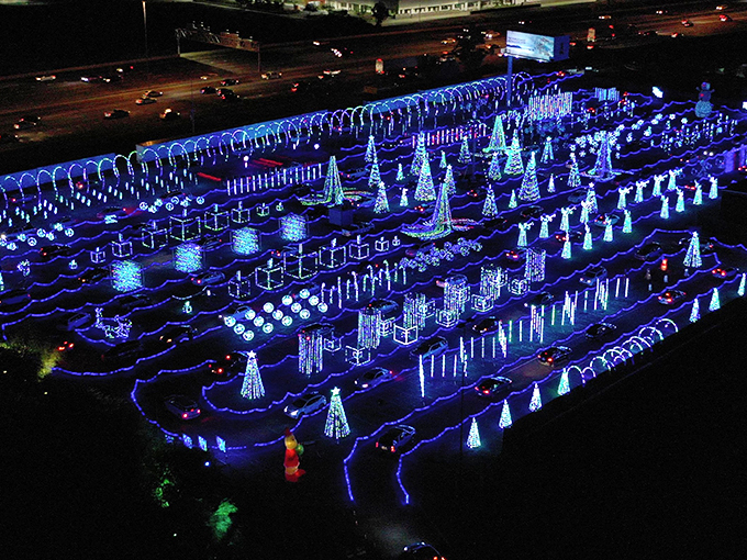 Behold the electric forest from above! It's as if someone spilled a giant box of glow sticks, creating a neon maze that would make even Pac-Man dizzy.