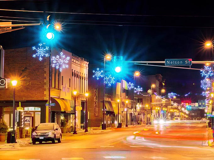 Main Street's holiday glow-up puts Vegas to shame. Who needs neon when you've got twinkling snowflakes and warm storefronts?