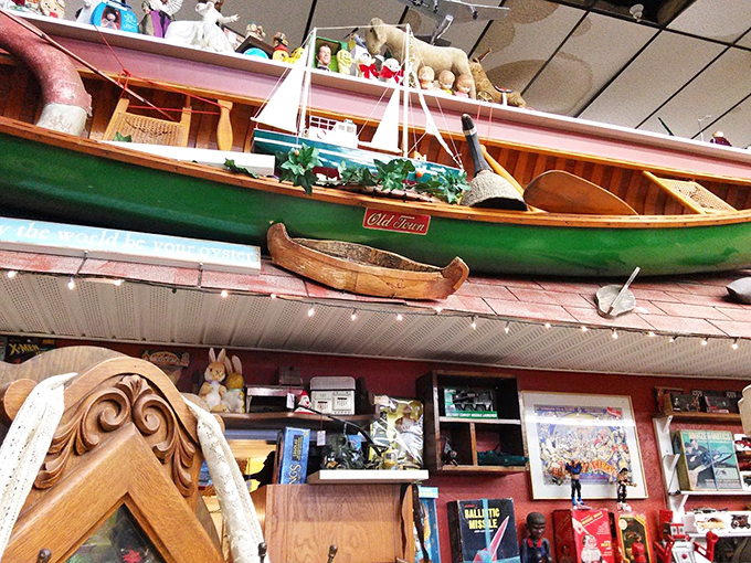 Ahoy, matey! This Old Town canoe isn't just a boat&mdash;it's a vessel for childhood memories, complete with a crew of nostalgic toys standing guard.