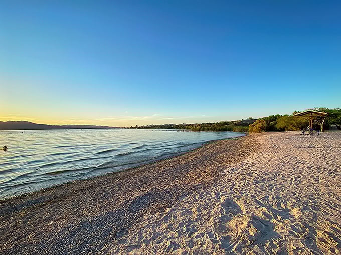 Lake Havasu's pristine shoreline stretches like nature's welcome mat, inviting visitors to wiggle their toes in golden sand.