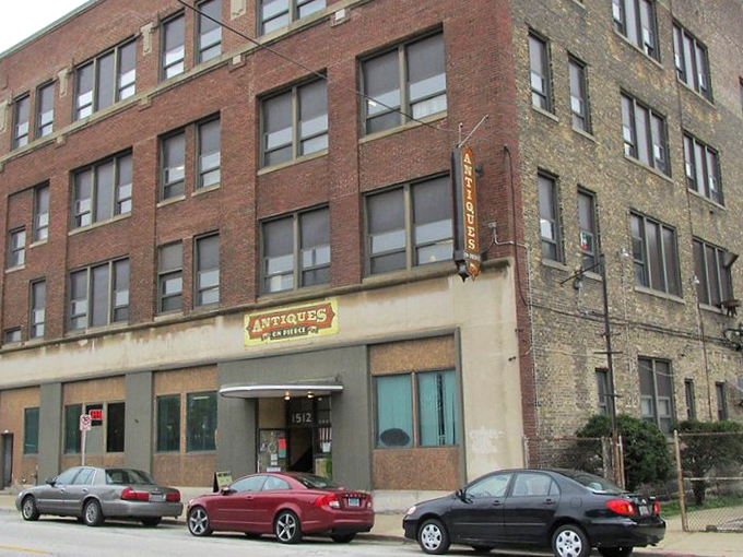 Brick and mortar time machine! This unassuming facade hides a multi-story wonderland of vintage treasures waiting to be discovered.