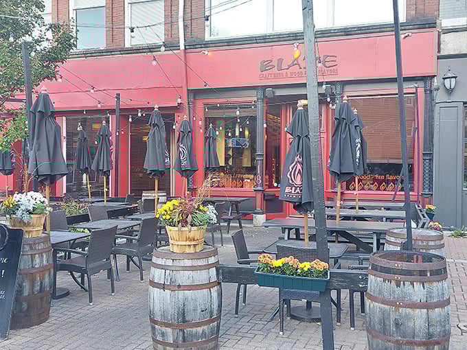 Blaze Bangor: Where the outdoor seating is so inviting, you might forget you're here to eat. Flower barrels and string lights? It's like a garden party, but with better pizza.