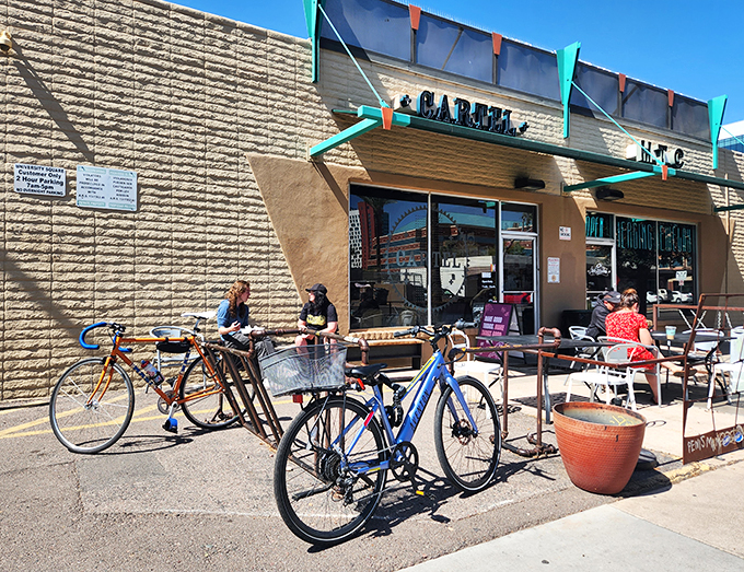 Cartel's outdoor seating: Where bikes and breakfast lovers unite. Sip your artisanal brew while watching the world (and students) roll by.