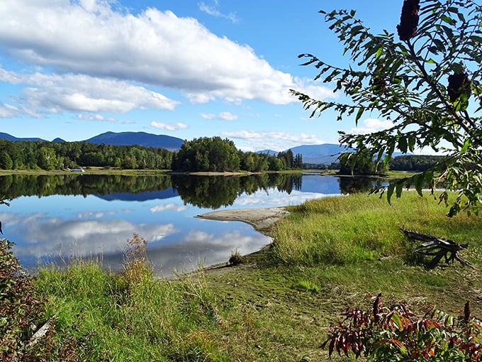 Flagstaff Lake: Nature's mirror reflecting mountains and memories. Beneath these serene waters lies a submerged town, waiting to be rediscovered.