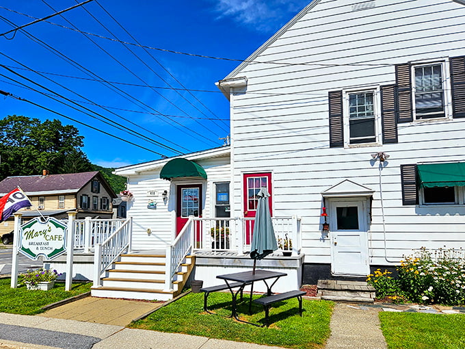 Mary's Cafe: Where nostalgia meets nourishment! This charming white house serves up slices of Americana with a side of maple-drizzled memories.
