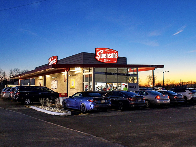 Fast food ninjas in action! Swensons' runners dash between cars, delivering burgers faster than you can say "Great Scott!"
