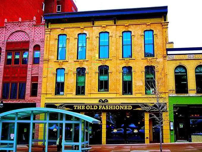 A splash of color in downtown Madison! This vibrant facade is like a beacon for hungry souls seeking Wisconsin comfort.
