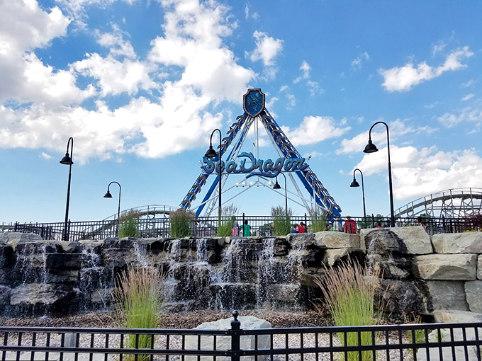 The Sea Dragon rises against a perfect Wisconsin sky, promising waves of excitement without the seasickness of actual sailing.