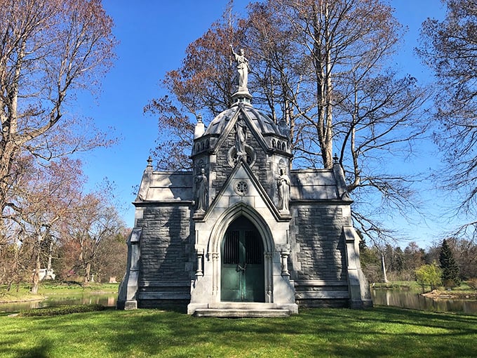 Talk about a lakeside property with curb appeal! This mausoleum's reflection game is stronger than my morning coffee.