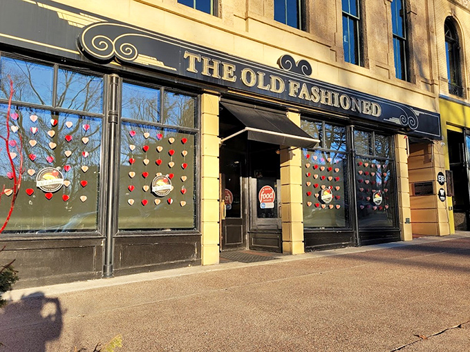Hearts and hops unite! The Old Fashioned's festive window display is a love letter to Wisconsin's favorite pastimes.
