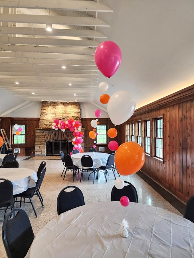 Balloons, wood paneling, and endless possibilities. This room is ready to host everything from your cousin's wedding to your book club's annual "We Mostly Came for the Wine" meeting.