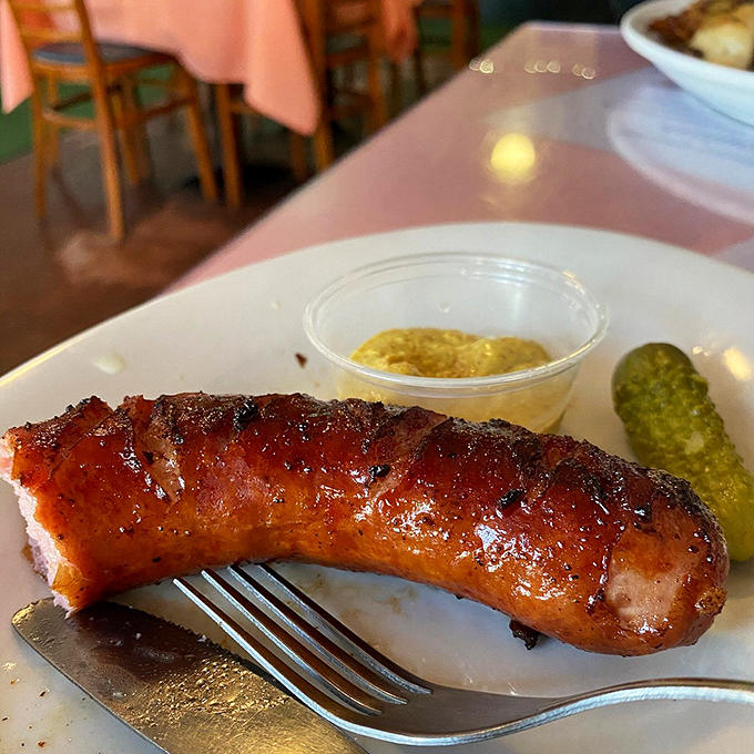 Behold, the Rolls-Royce of sausages! This kielbasa is so perfectly grilled, it might just make you want to polka dance on the table. Photo credit: Sam