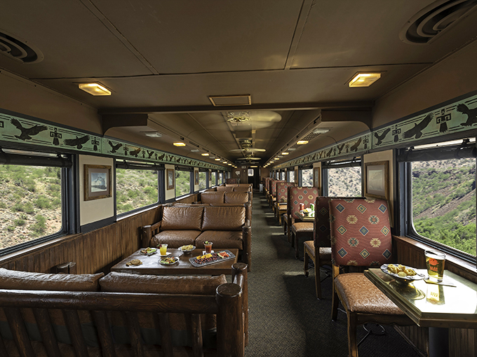 Step into a time machine with leather seats! This first-class car is giving serious Orient Express vibes, minus the murder mystery (we hope).