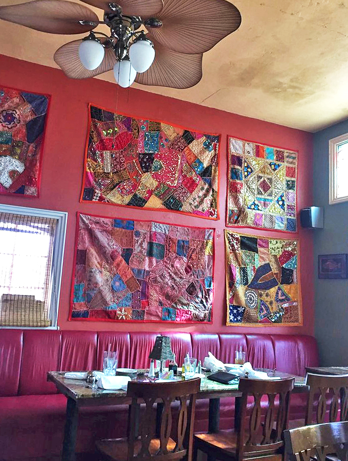 Quilts that could tell a thousand tales adorn these walls. It's like dining inside your cool grandma's cozy living room &ndash; if she were a gourmet chef.