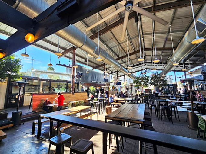 Natural light streams through open-air spaces, creating the perfect blend of indoor comfort and outdoor Arizona vibes.