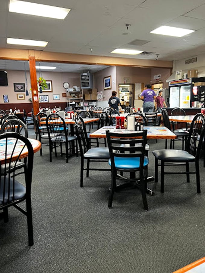 Where conversations flow as freely as the coffee, with hanging plants adding a touch of green to this cozy breakfast sanctuary.
