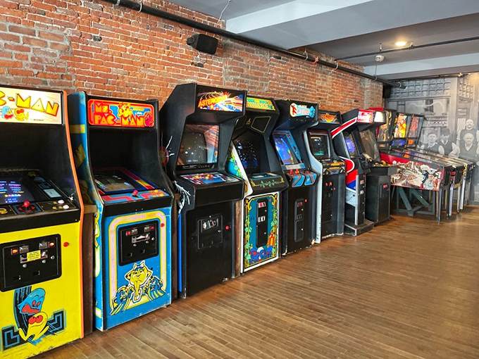 Pac-Man fever, catch it! A row of classic cabinets stands ready to transport you back to the days of acid-wash jeans and big hair.