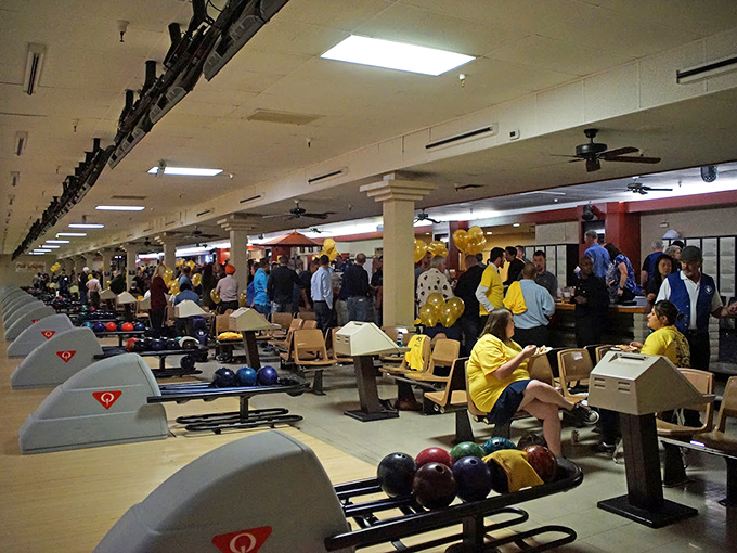 A bustling scene of weekend warriors and casual bowlers alike, proving that some traditions just keep rolling along beautifully.