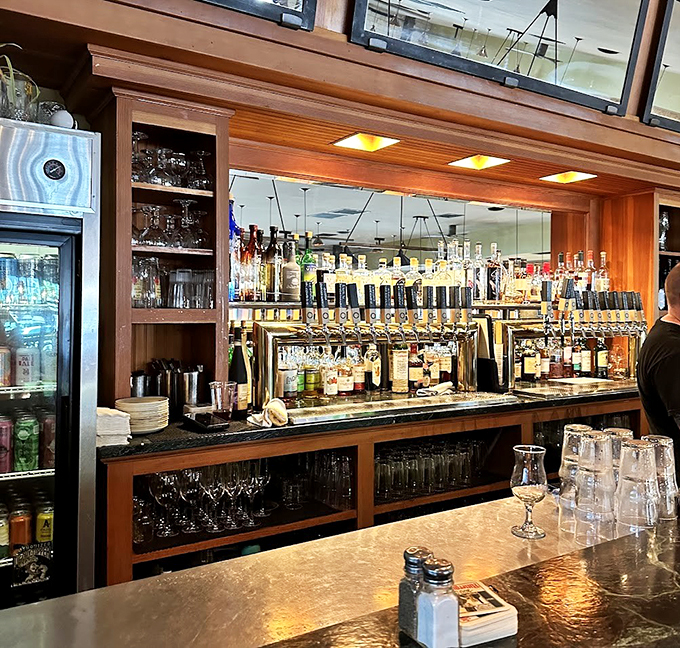 This isn't just a bar - it's a liquid library of Vermont's finest spirits and brews, lined up like soldiers ready for duty.