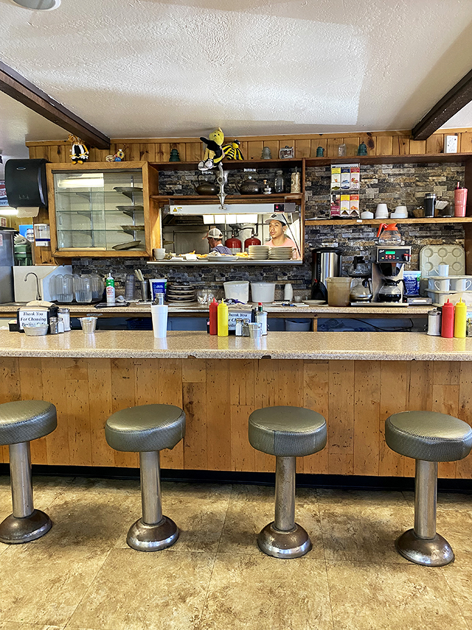 Pull up a stool and join the breakfast club. This counter has heard more stories than a librarian and served more eggs than a chicken farm. Photo credit: Erika B