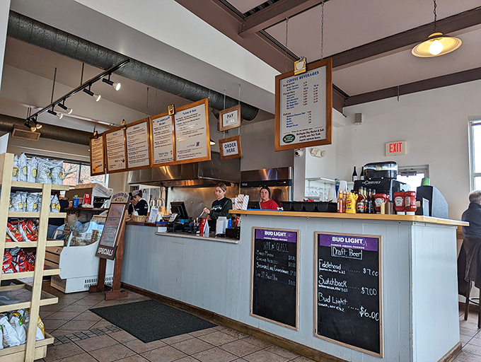 Order up! This bustling counter is where culinary dreams come true. Pro tip: Everything looks good, so close your eyes and point! 