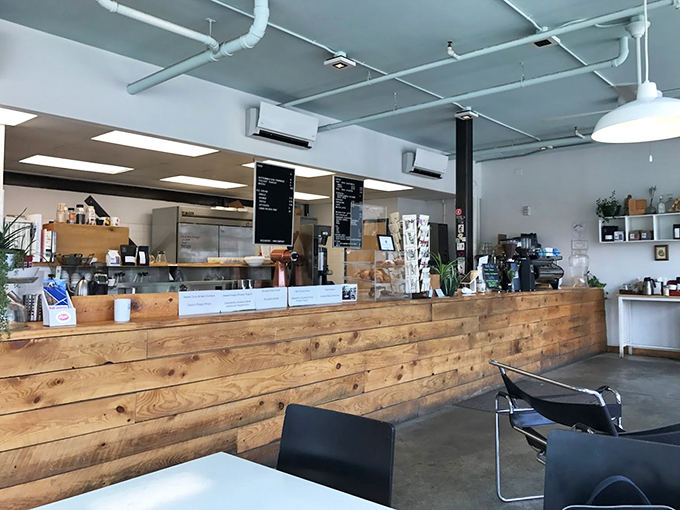 Behind this rustic wooden counter, coffee wizards and ice cream artisans work their magic, backed by a menu of daily delights.