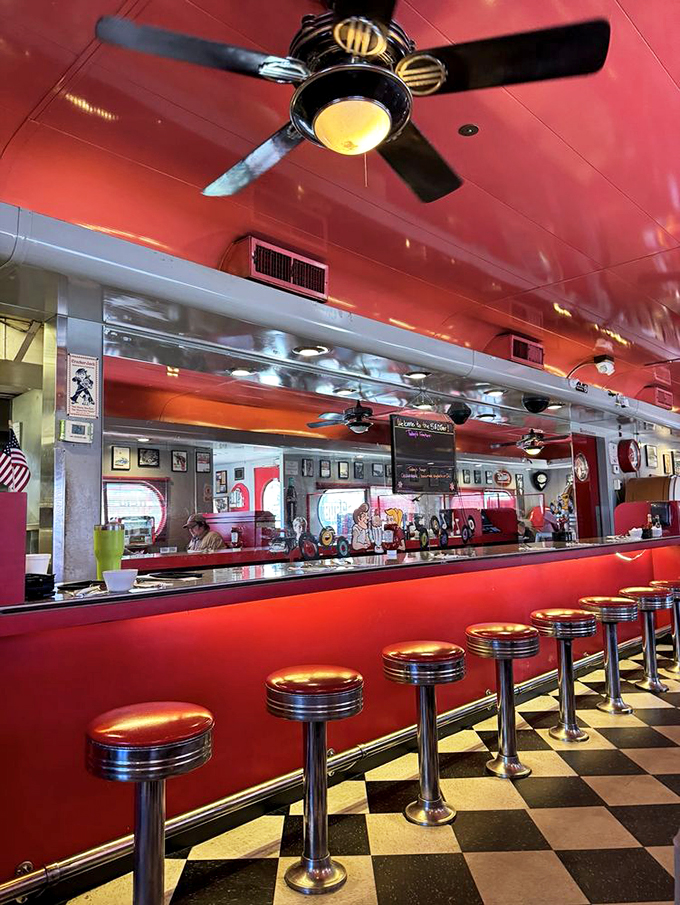 Pull up a chrome stool at this gleaming counter, where every seat feels like front-row tickets to a delicious slice of Americana. Photo credit: Liliana A.