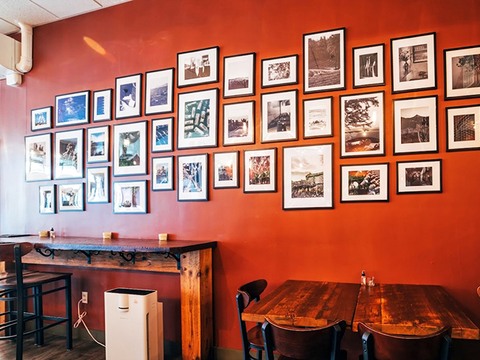 A gallery wall tells Portland's story in black and white, turning a simple meal into dinner and a show.